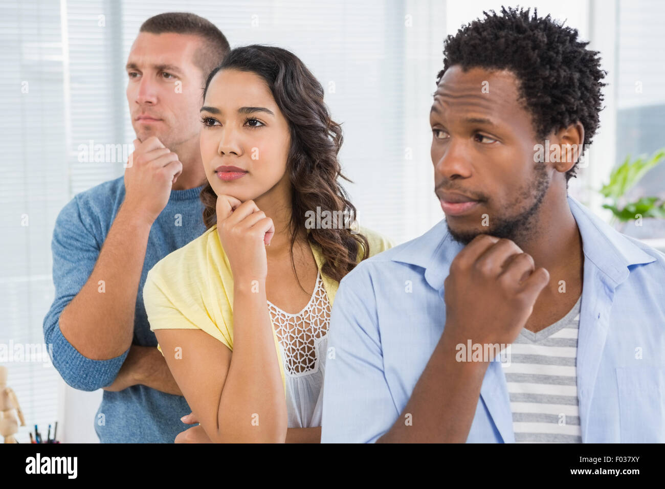 Portrait of focused colleagues Stock Photo - Alamy