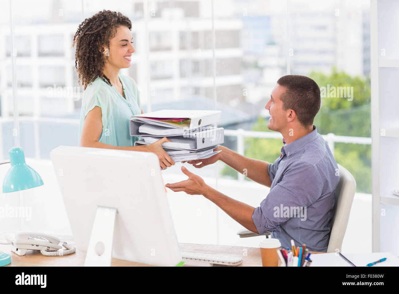 Carrying a binder hi-res stock photography and images - Alamy