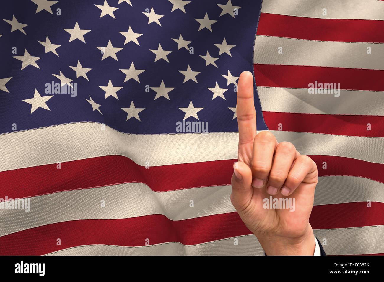 Composite image of hand pointing Stock Photo - Alamy