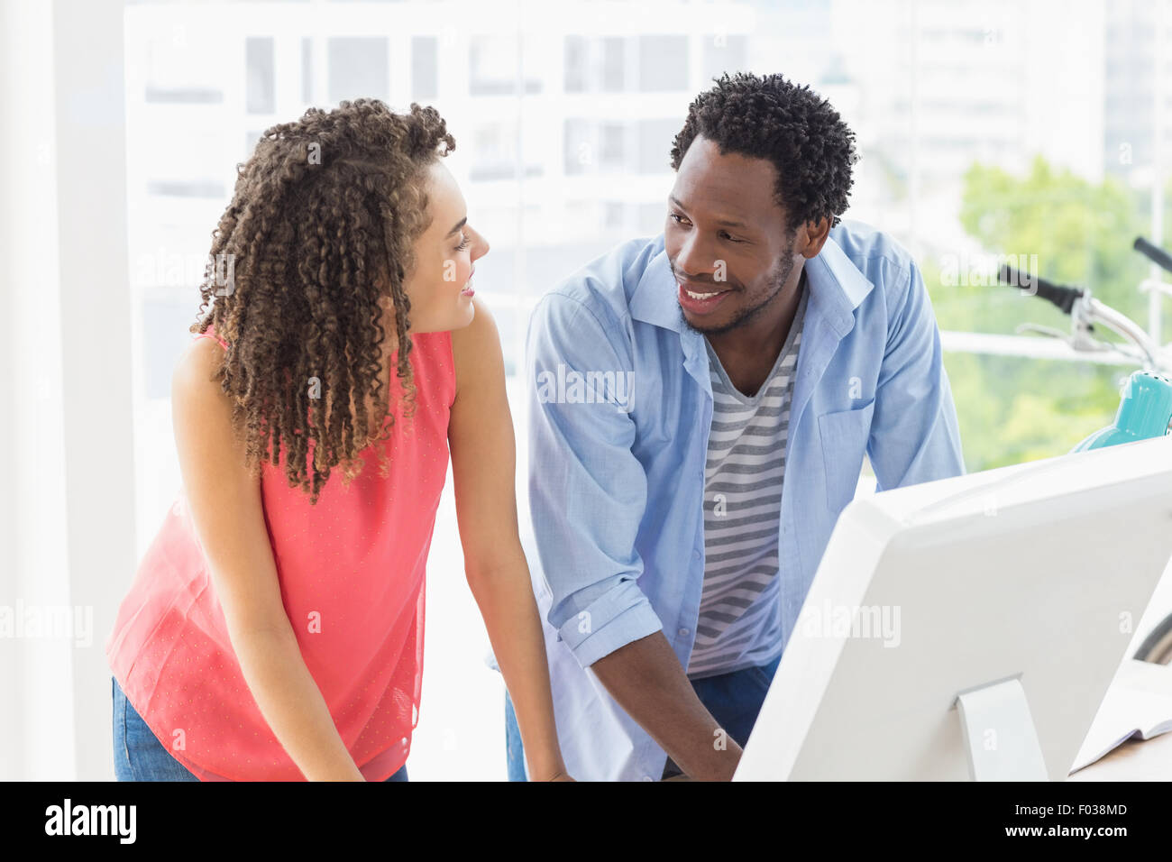 Two creative business colleagues talking together Stock Photo - Alamy Two creative business colleagues talking together Stock Photo - Alamy