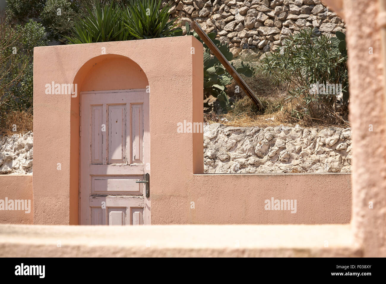 A door leading into an open Greek terrace Stock Photo - Alamy