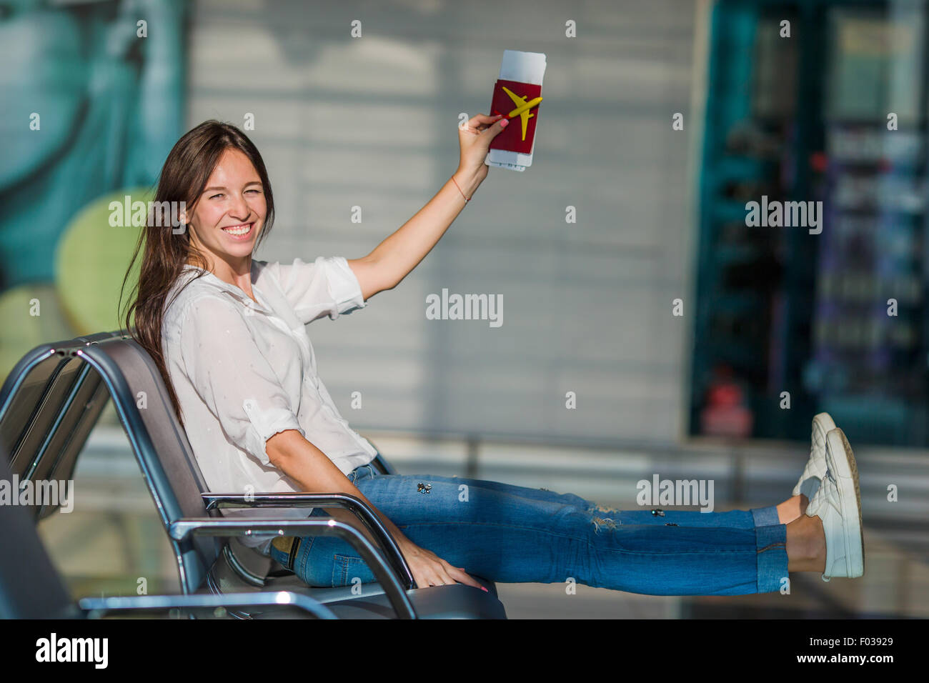 Woman airplane model passports flight hi-res stock photography and ...
