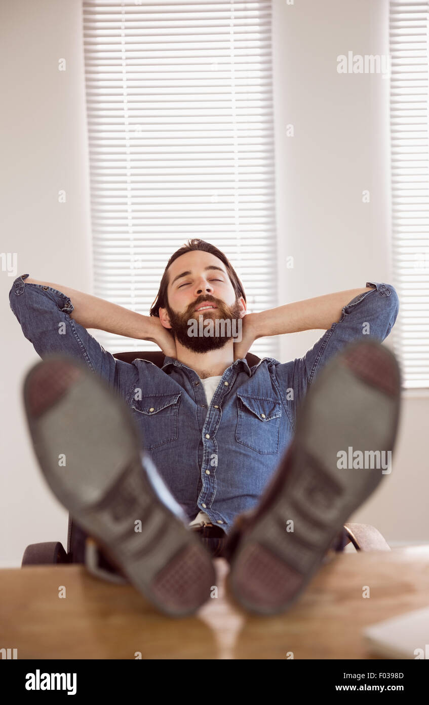 Businessman desk office leaning back hi-res stock photography and ...