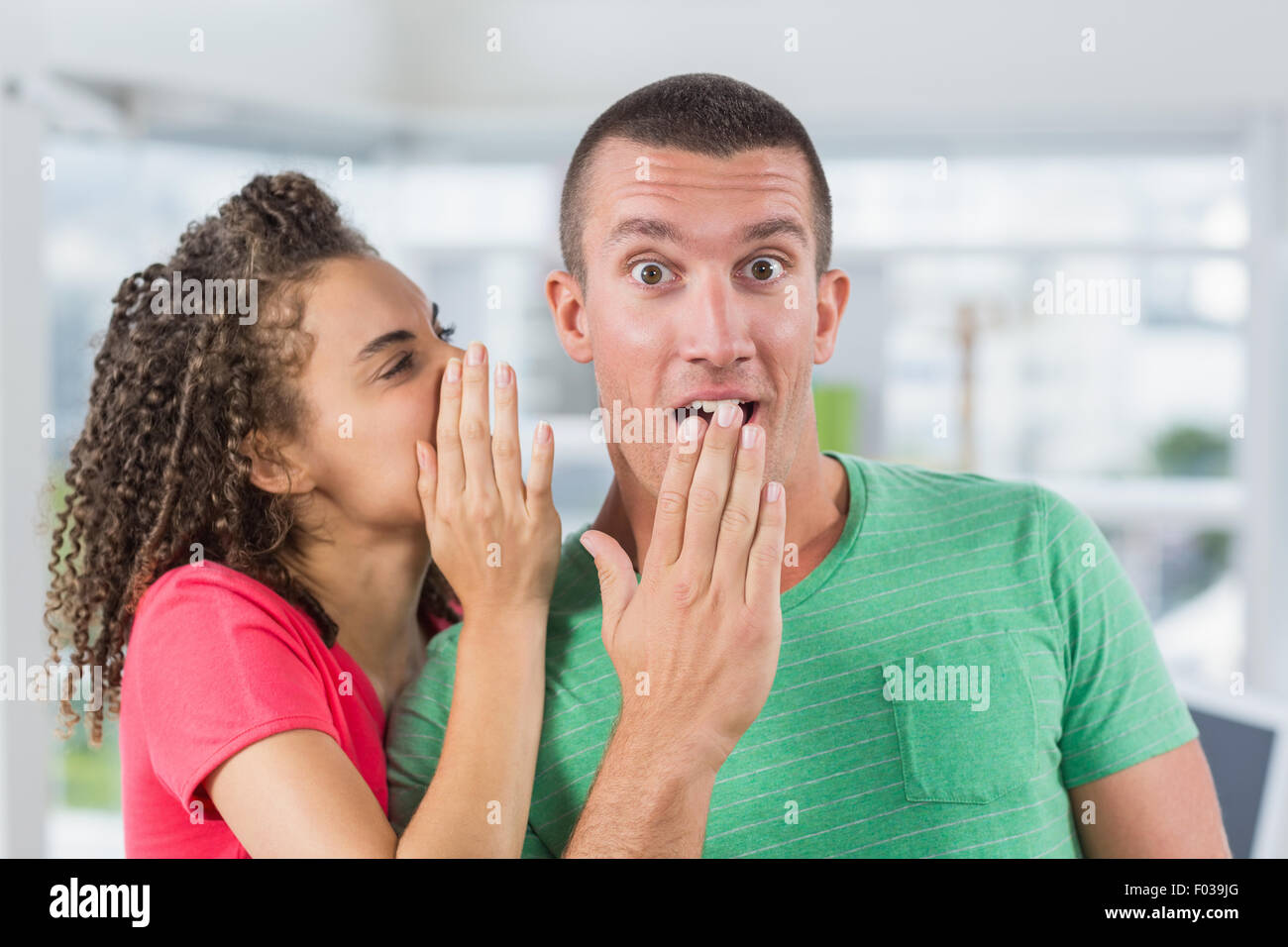 Office talking secret hi-res stock photography and images - Alamy