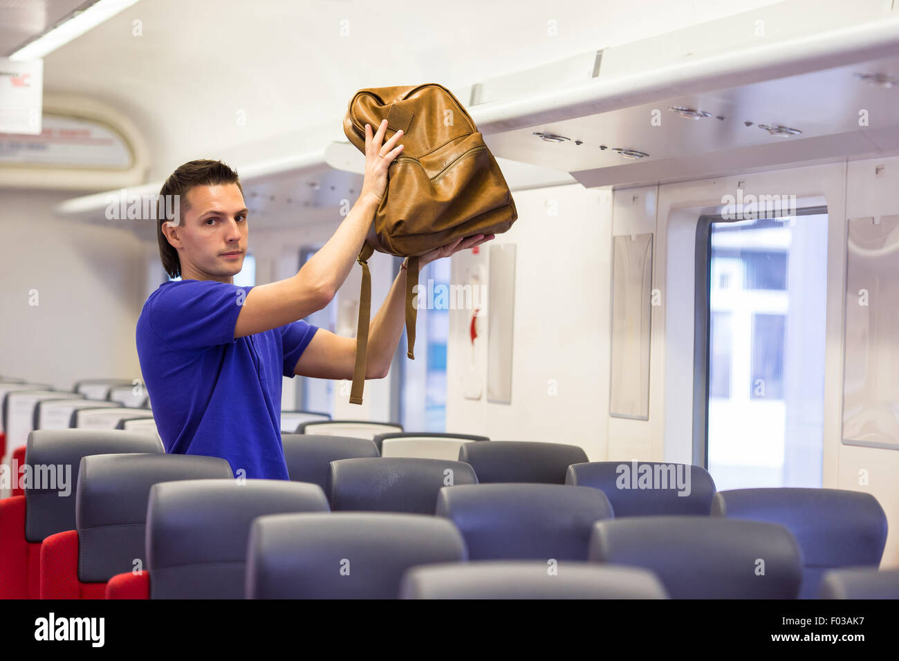Businessman boarding into train hi-res stock photography and images - Alamy