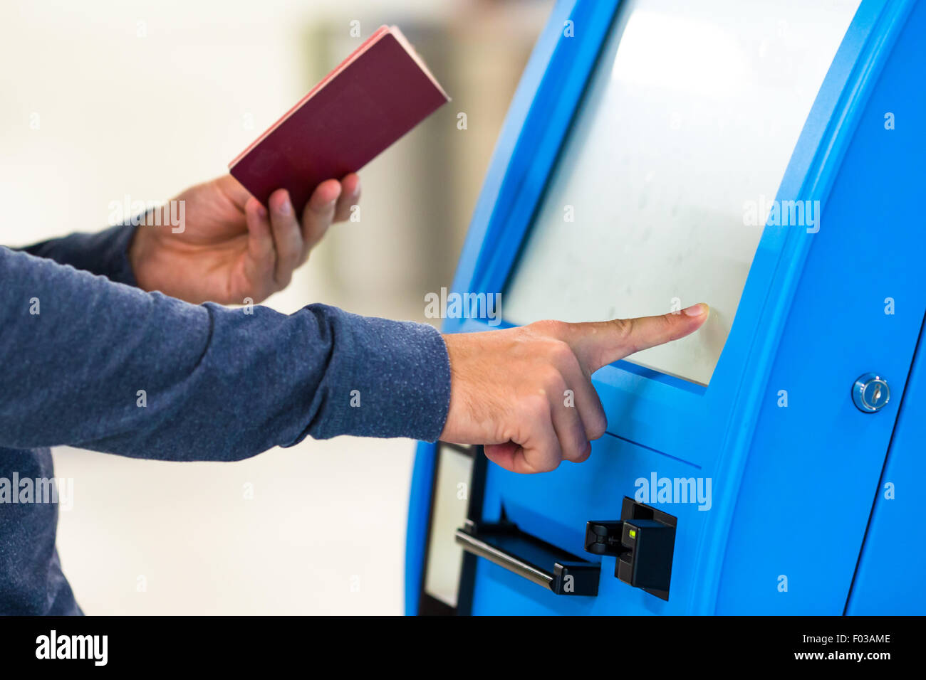 Automat for printing boarding tickets in airport Stock Photo - Alamy