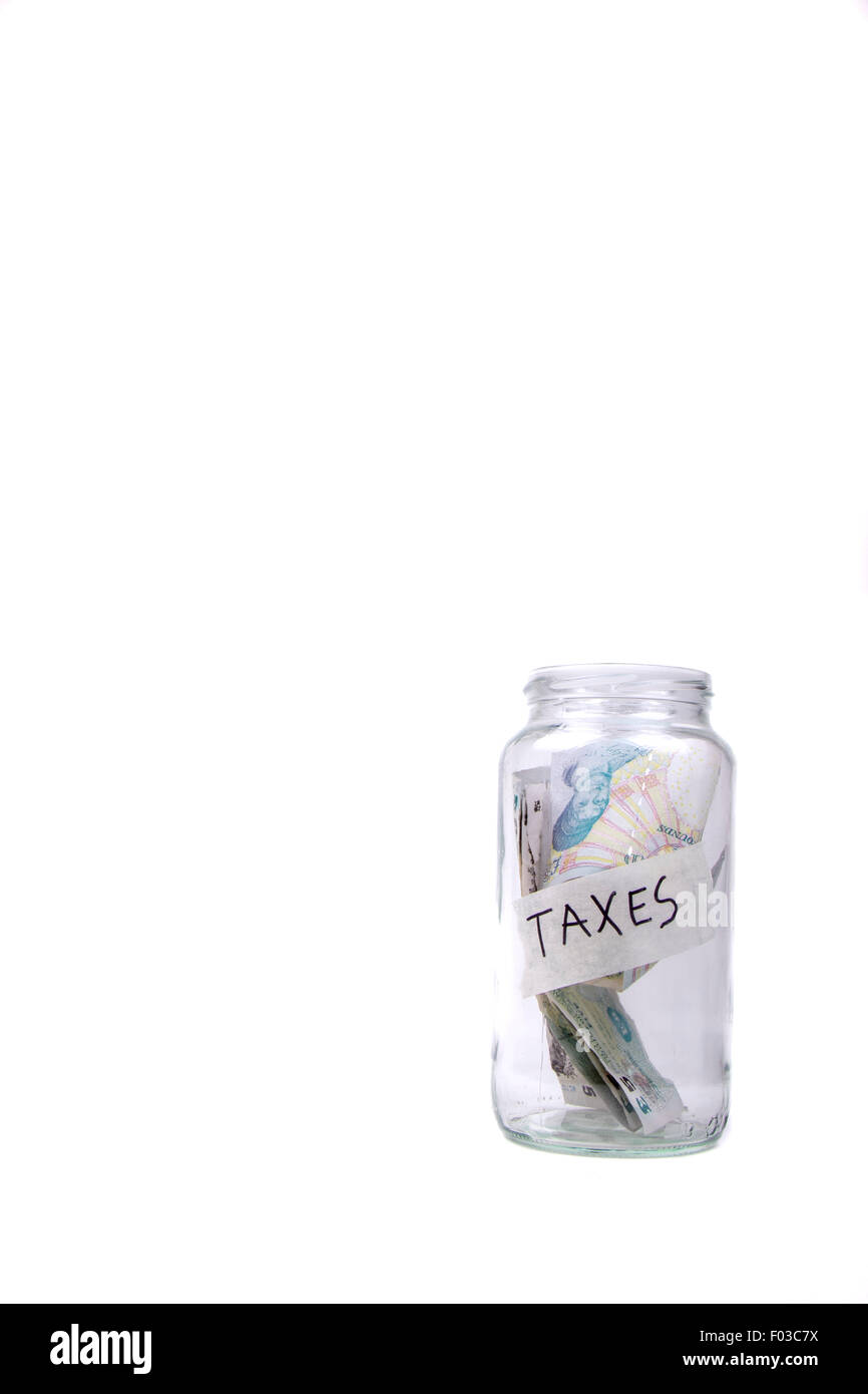 Five Pound Notes in a Glass Jar Saving up To Pay Taxes Stock Photo - Alamy