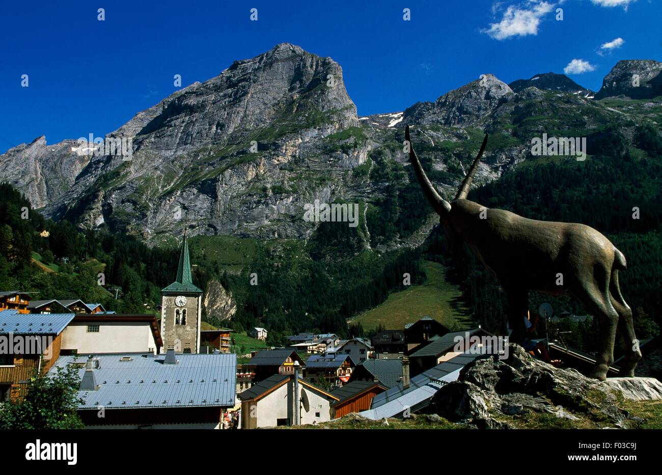 Ibex statue and view of Pralognan-La-Vanoise, Vanoise National Park ...