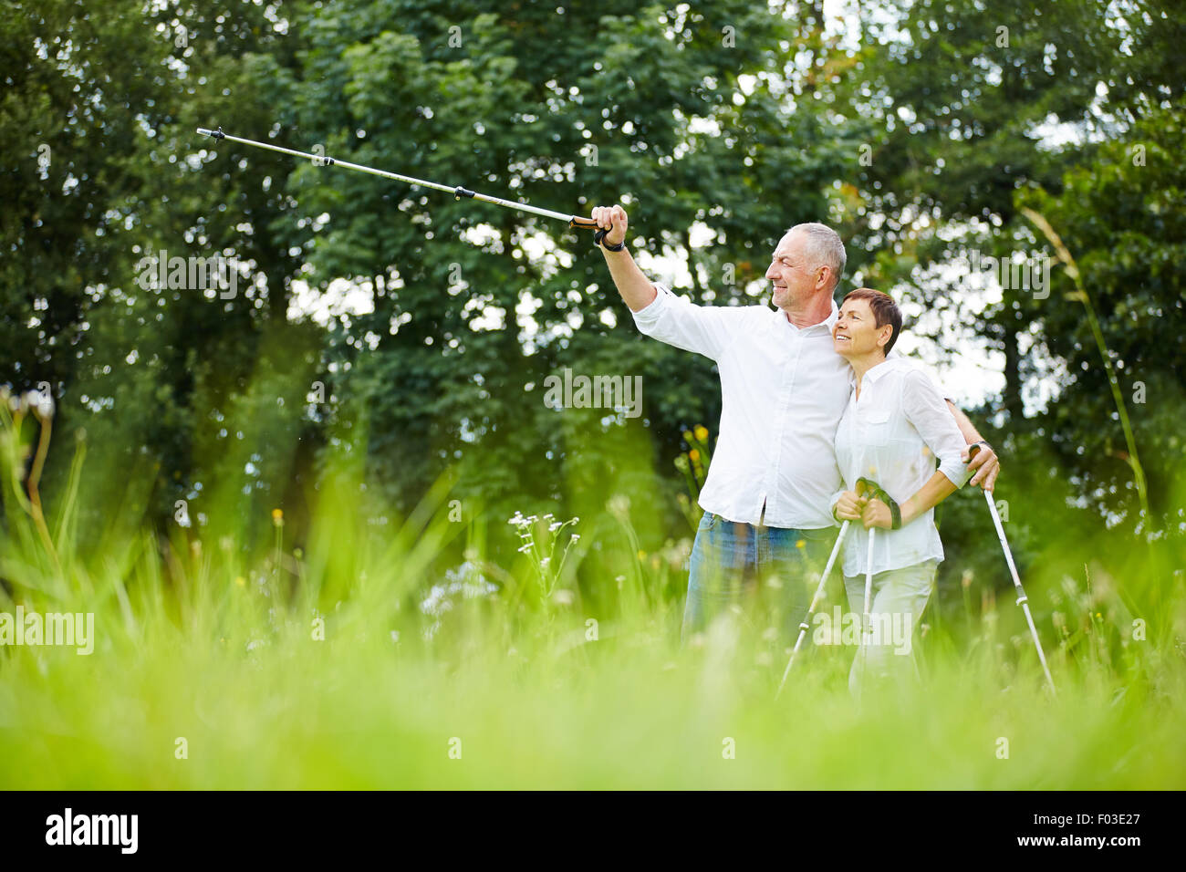 Pointing walking stick hi-res stock photography and images - Alamy
