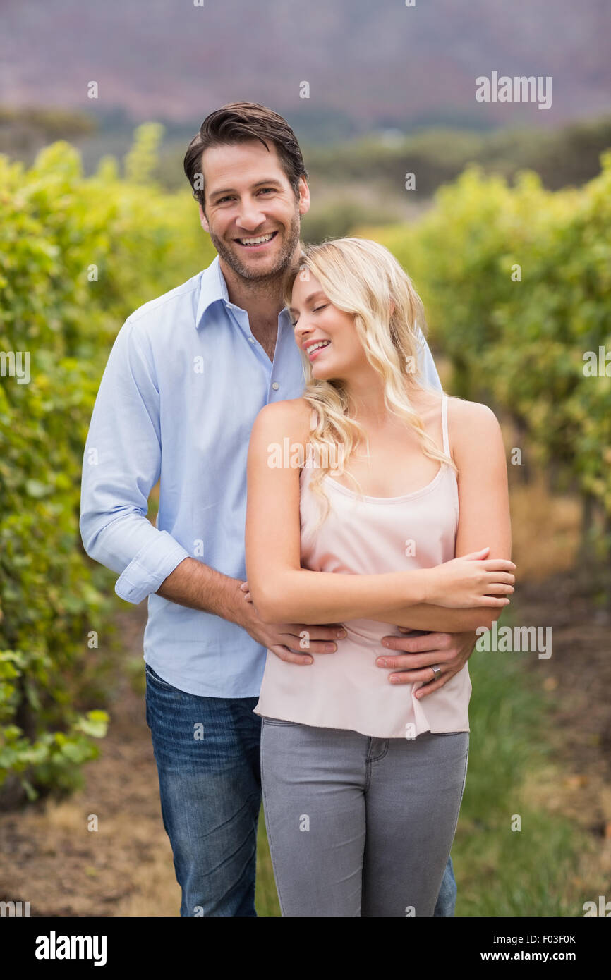 Young happy couple embracing each other Stock Photo - Alamy