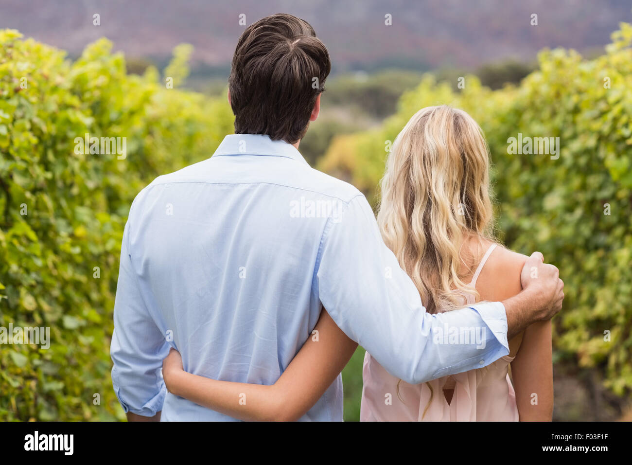 Arm Around Shoulder Couple Walking