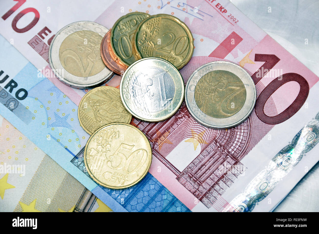 Collection of Euro coins and bank notes Stock Photo - Alamy