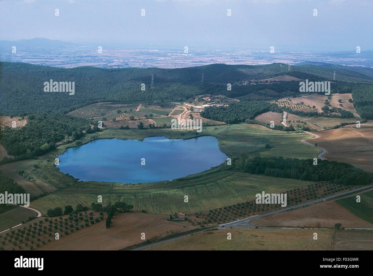 Aerial view of the lake Lago dell'Accesa and the surrounding ...