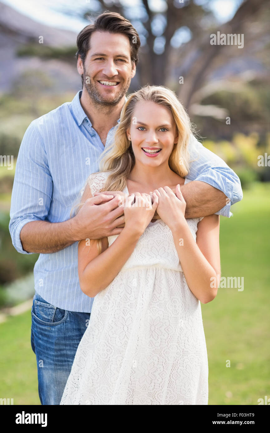 Cute couple on date looking at the camera Stock Photo - Alamy