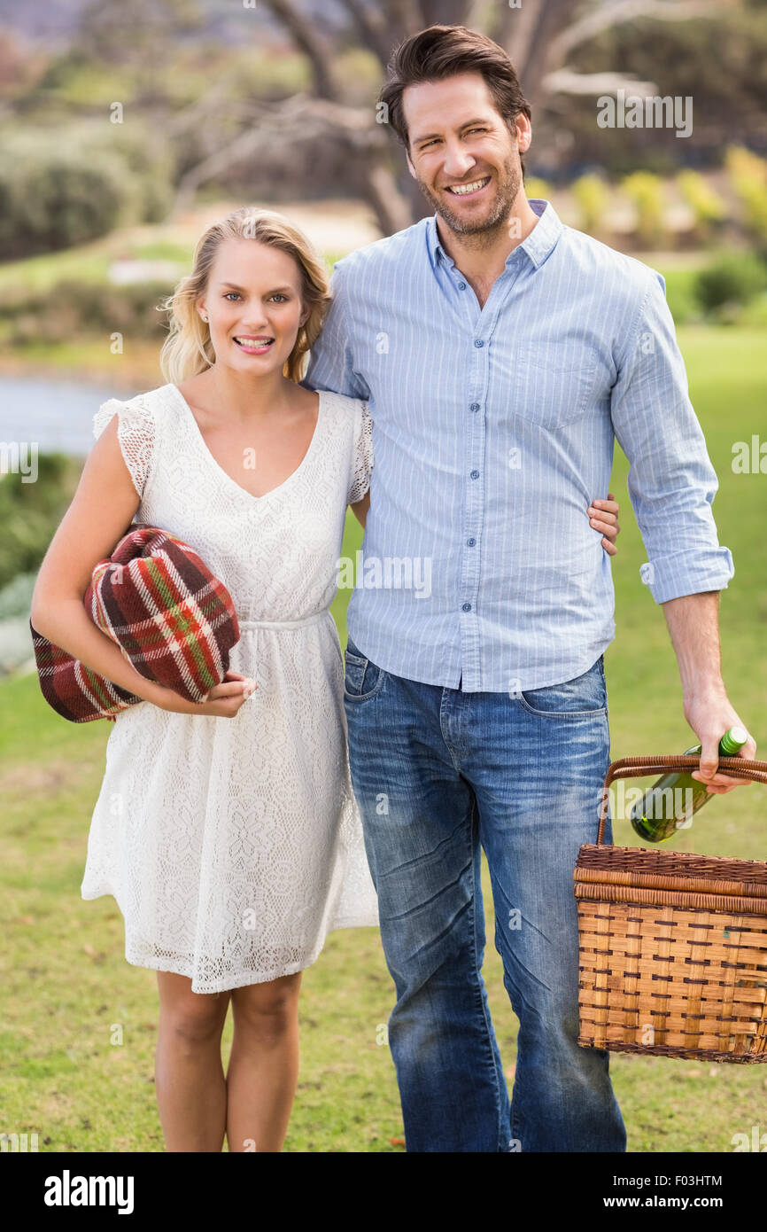 Cute couple on date looking at the camera Stock Photo - Alamy