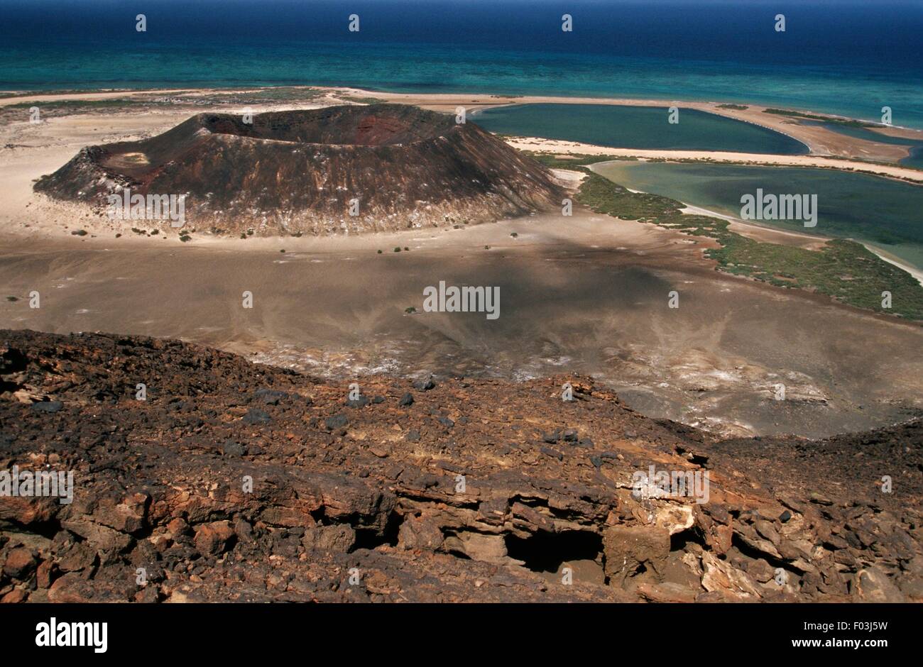 Yemen, Al Zubair Archipelago, Island of Saba, volcanic crater by lagoon ...