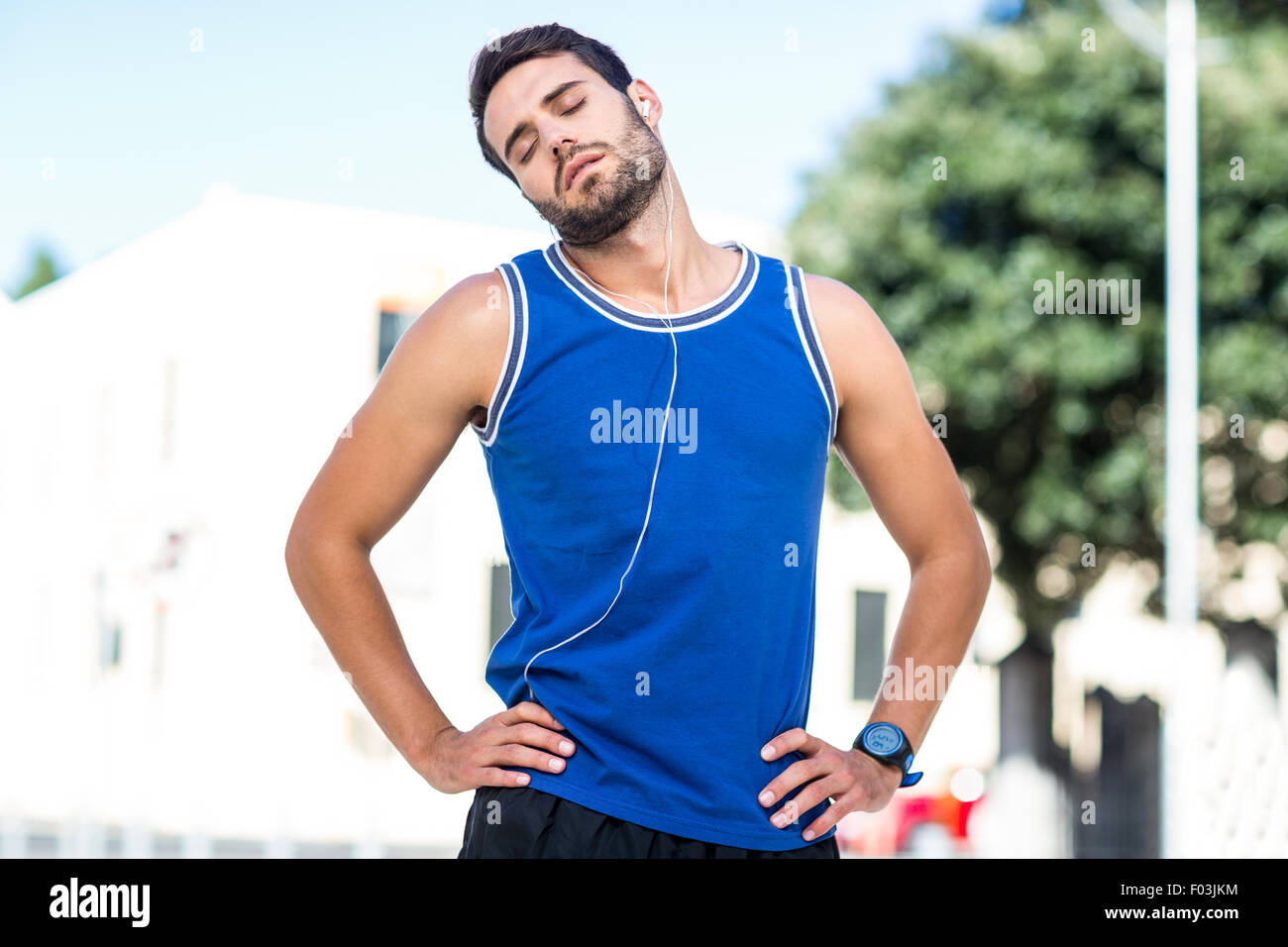 An handsome athlete stretching his neck Stock Photo - Alamy