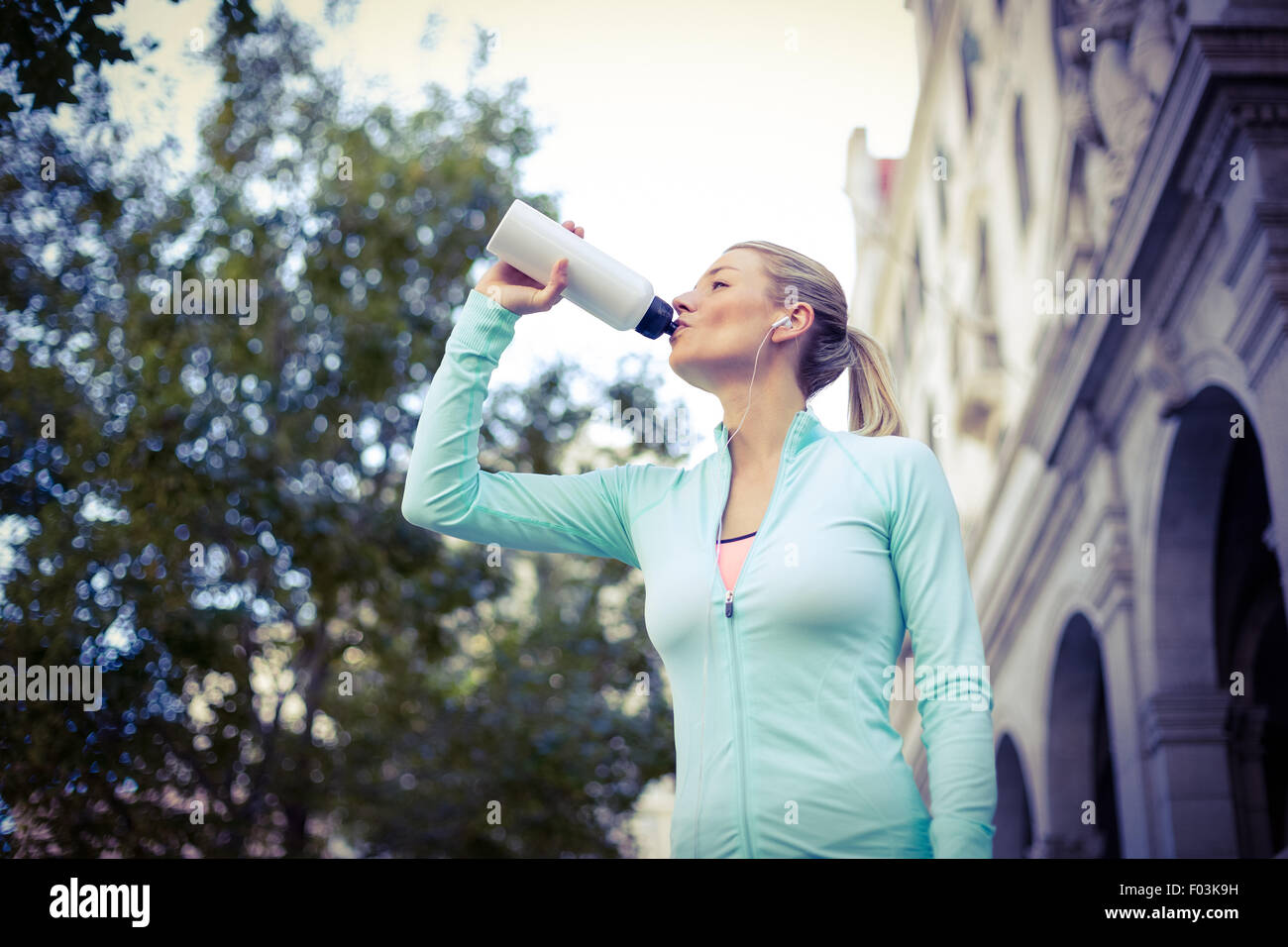 Woman drinking spring water hi-res stock photography and images - Alamy