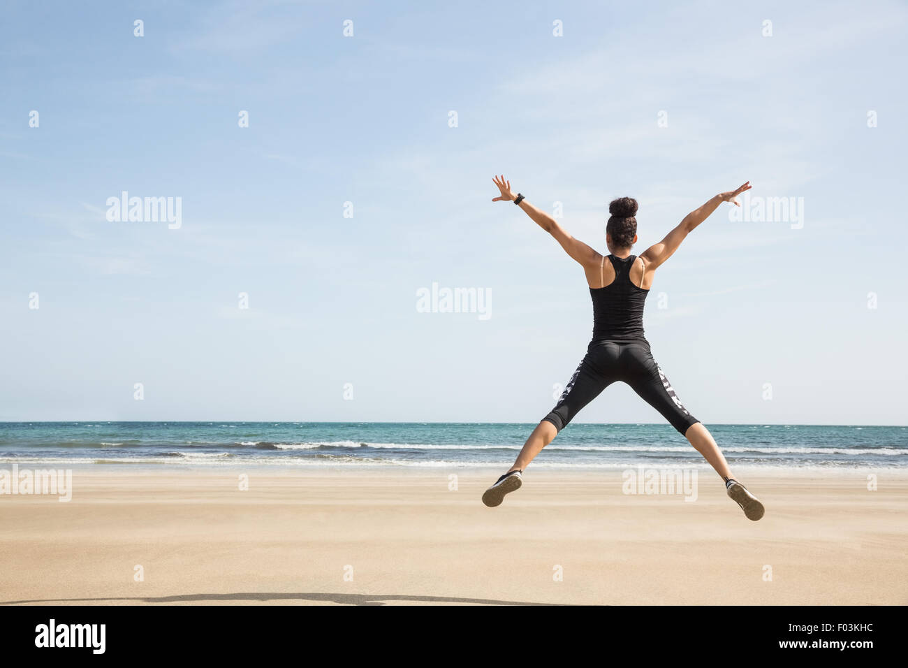 Leaping woman hi-res stock photography and images - Alamy