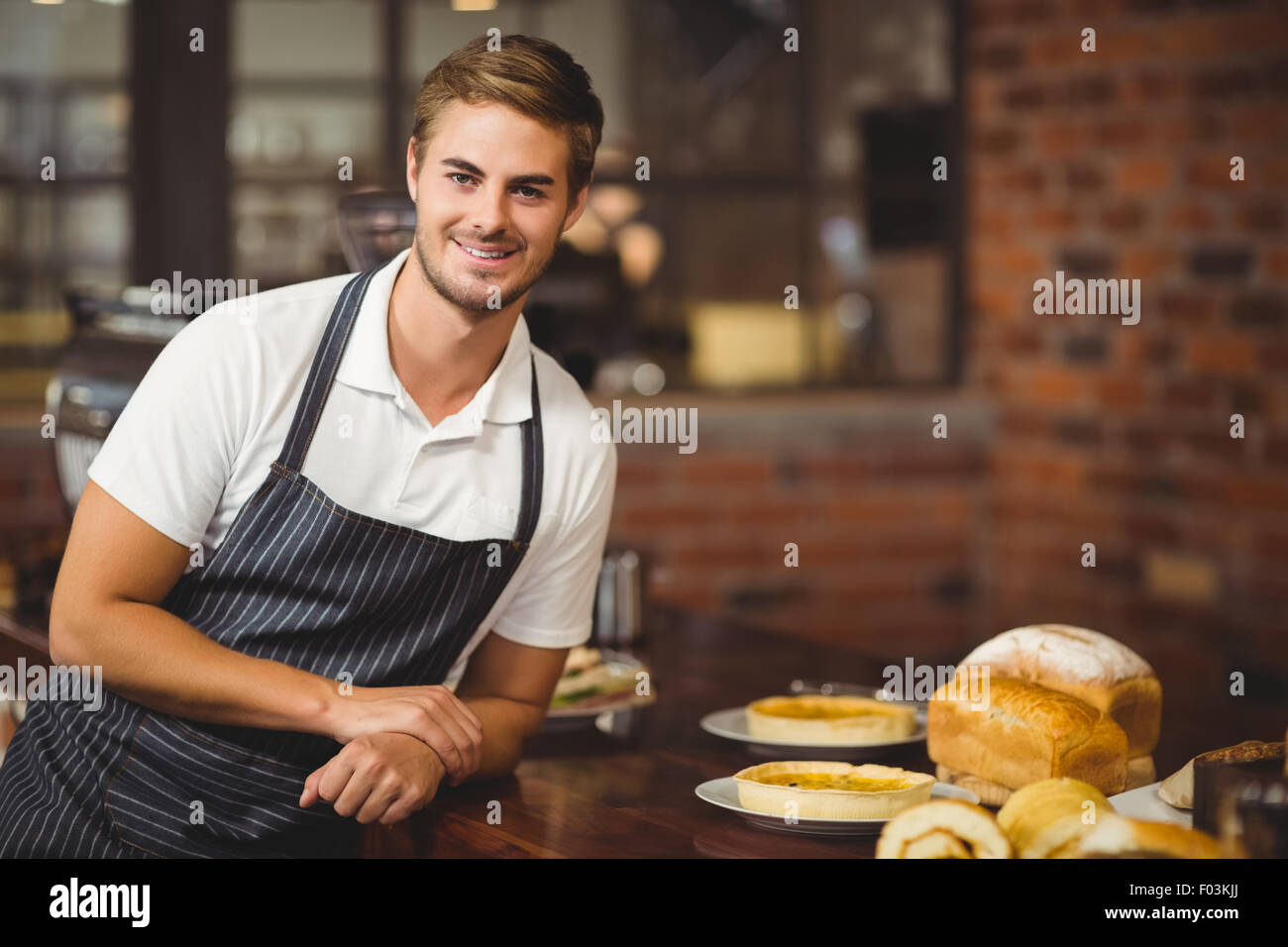Worker leaning on table hi-res stock photography and images - Alamy