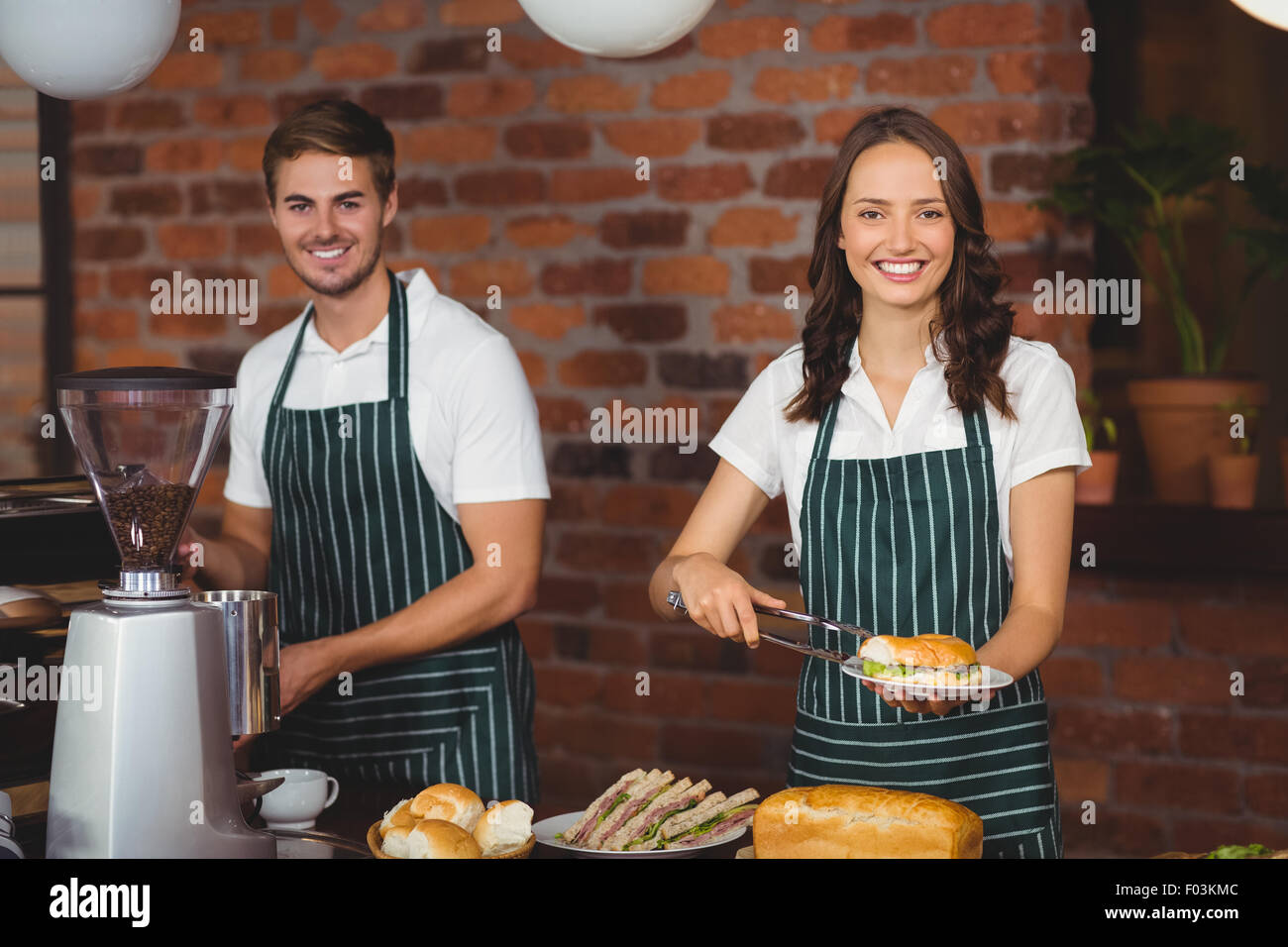 Restaurant workers smiling service industry hi-res stock photography ...