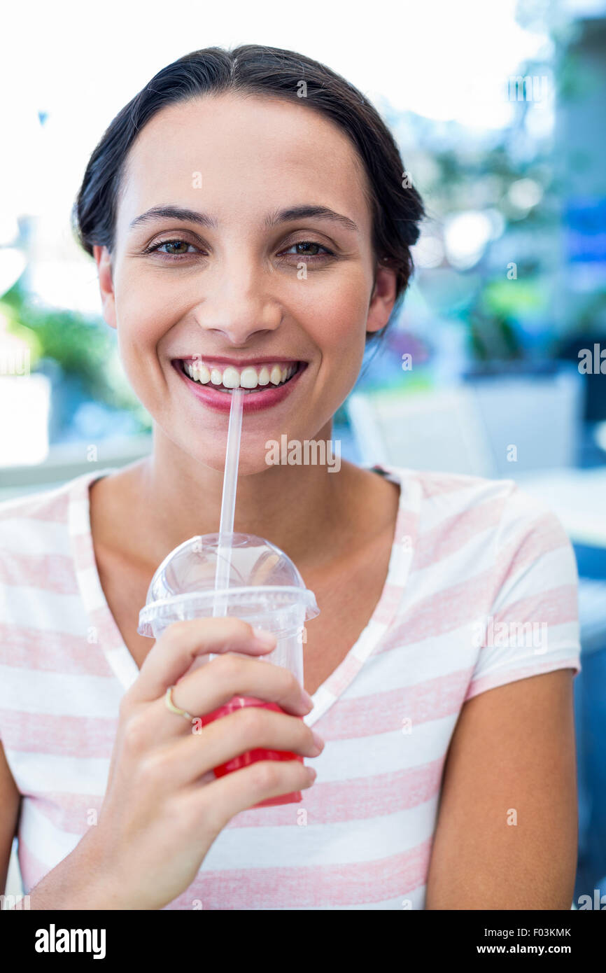 Beautiful woman drinking pink milkshake hi-res stock photography and ...