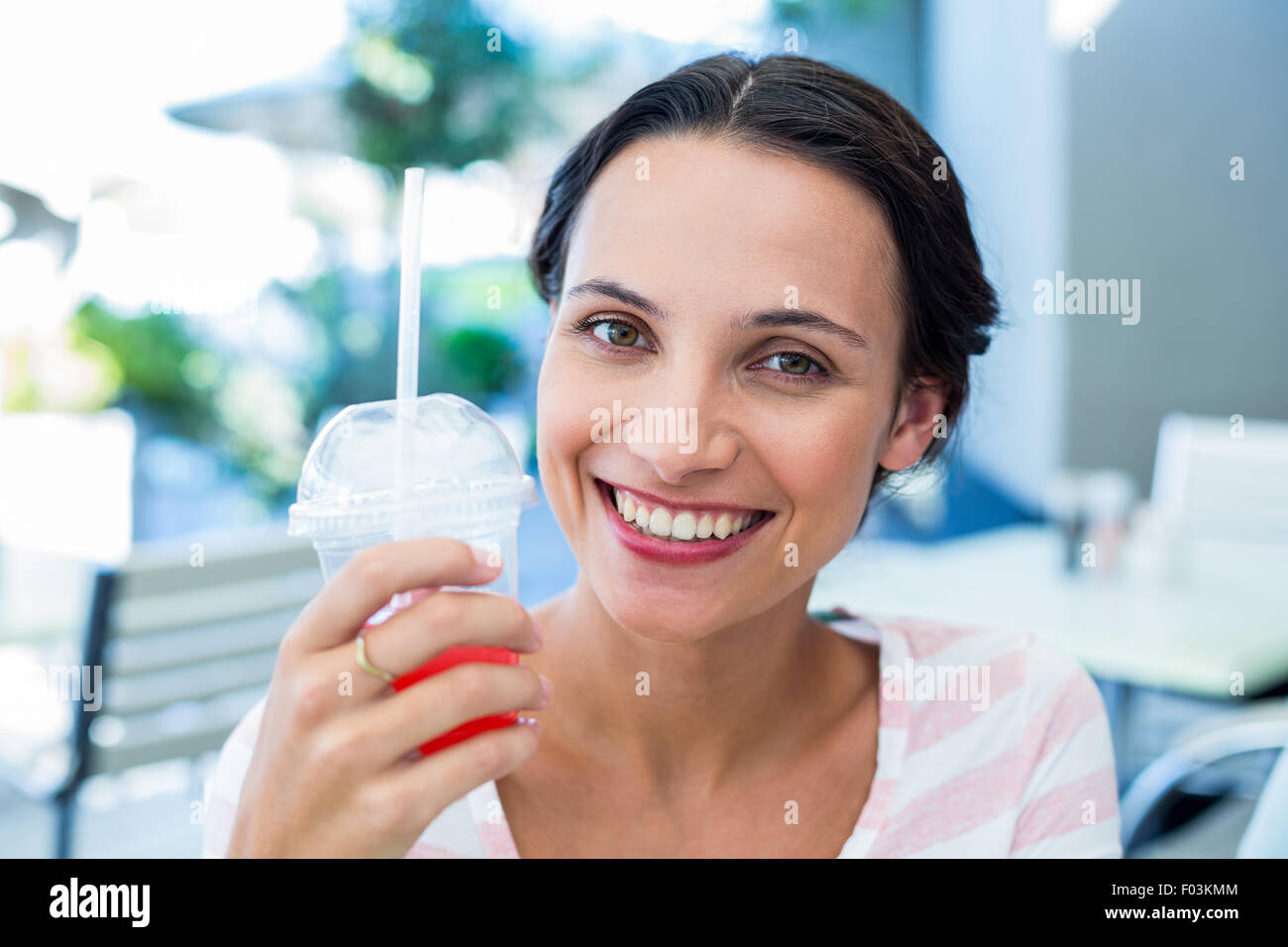 Beautiful woman drinking pink milkshake hi-res stock photography and ...