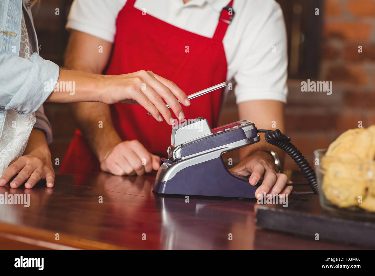 Close up mobile terminal payment hi-res stock photography and images ...