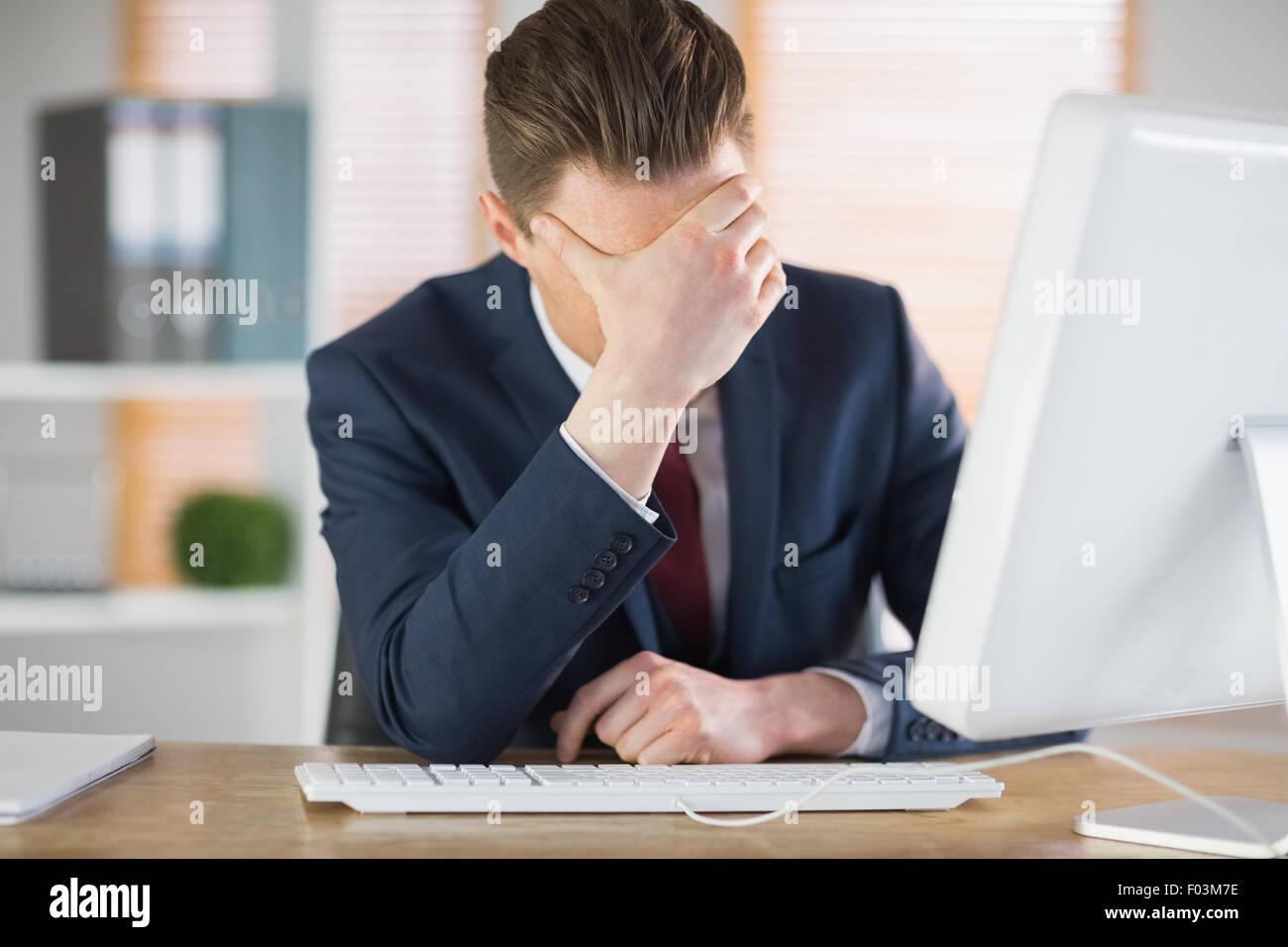 Worried businessman working desk hi-res stock photography and images ...