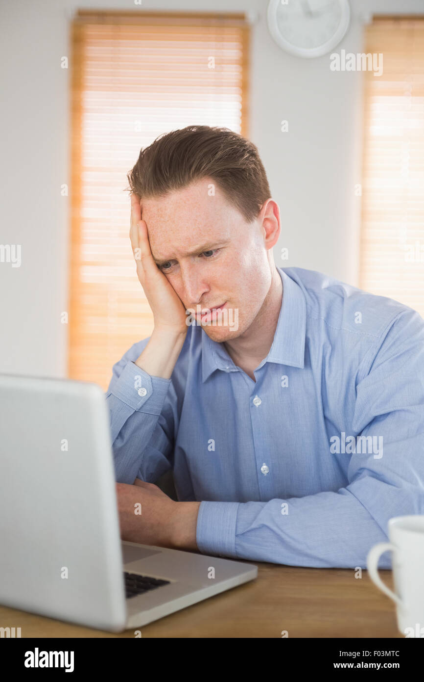 Stressed looking at laptop hi-res stock photography and images - Alamy