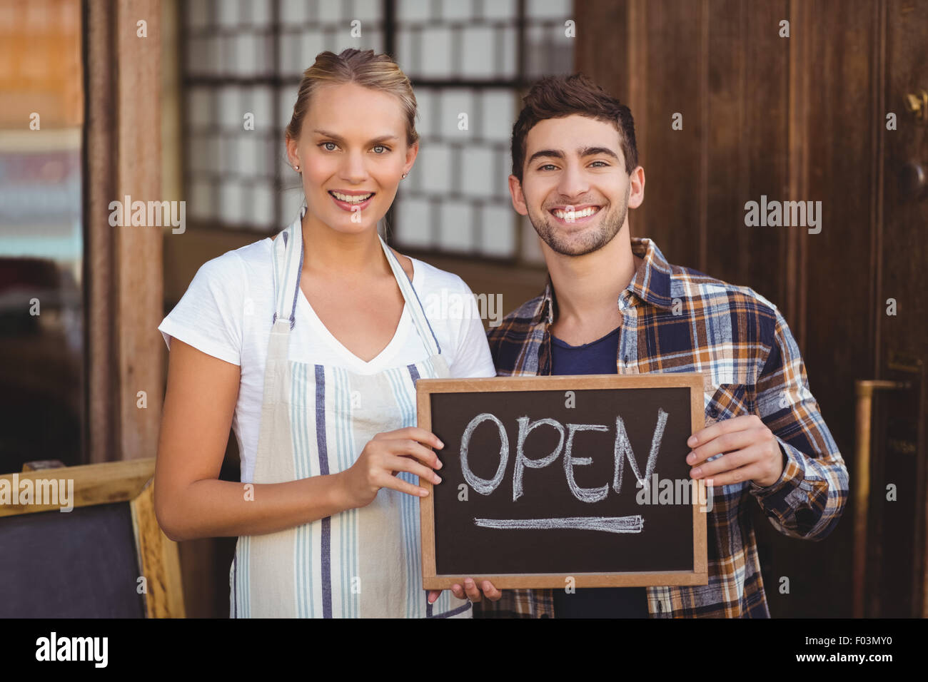 Man waiter sign light hi-res stock photography and images - Alamy