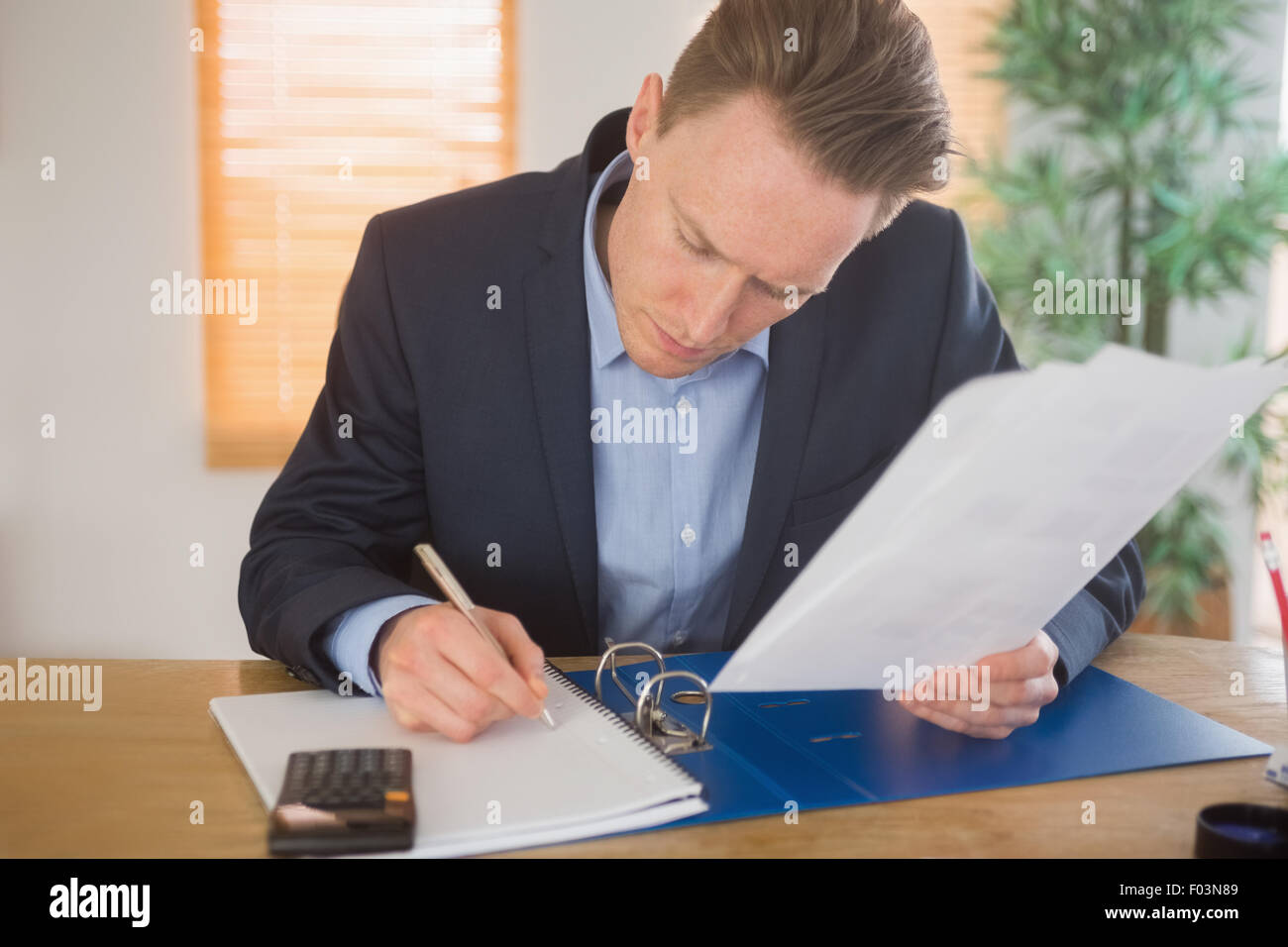 Concentrated businessman reading a document Stock Photo - Alamy Concentrated businessman reading a document Stock Photo - Alamy