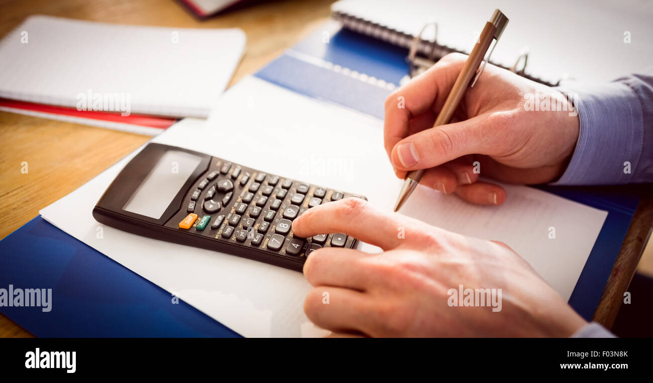 Businessman hands typing and writing Stock Photo - Alamy