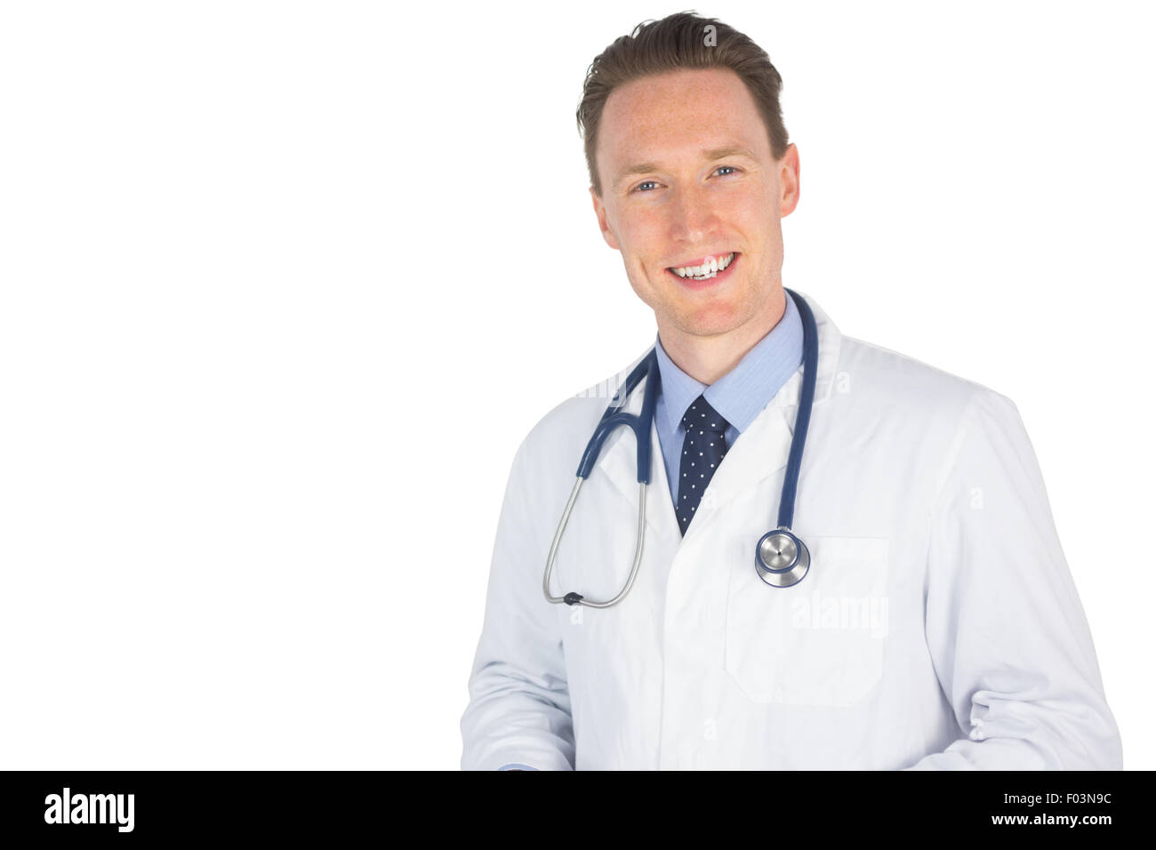 Smiling doctor looking at the camera Stock Photo - Alamy