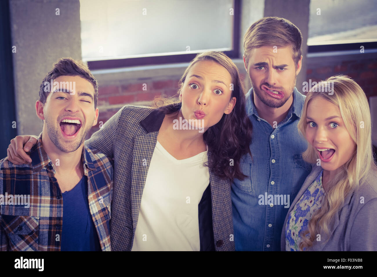 Grimacing friends having fun Stock Photo - Alamy