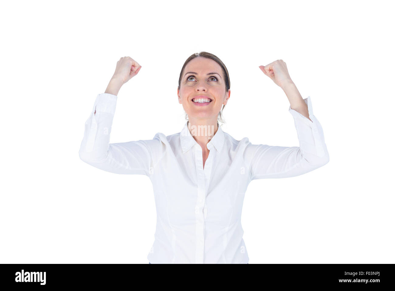 Businesswoman cheering with arms up Stock Photo - Alamy