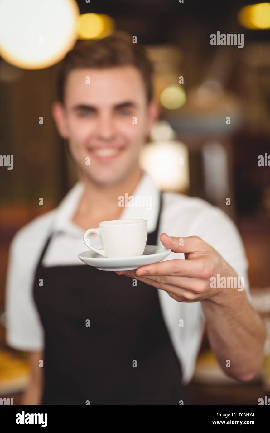 Offering cup hi-res stock photography and images - Alamy