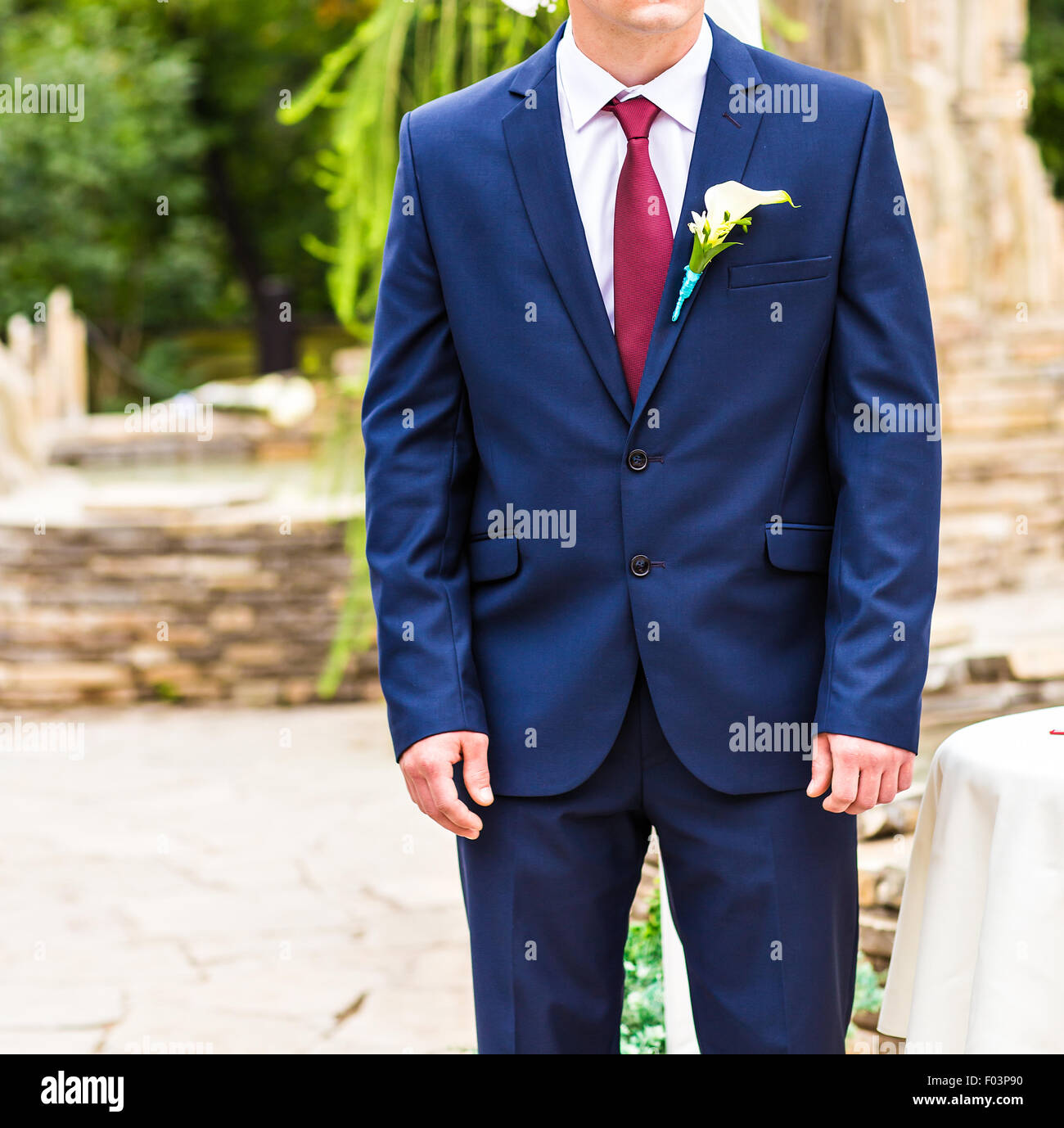 Handsome groom at wedding waiting for bride Stock Photo - Alamy