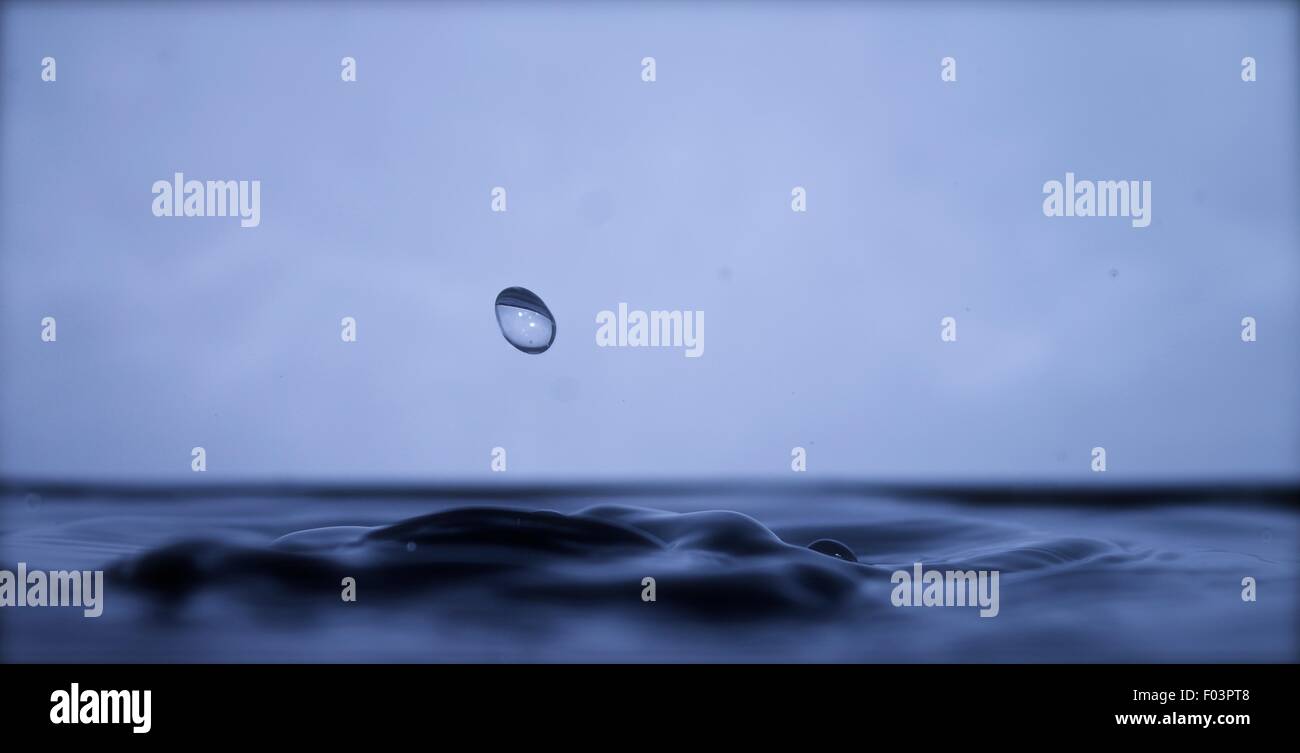 Falling water drop Stock Photo - Alamy