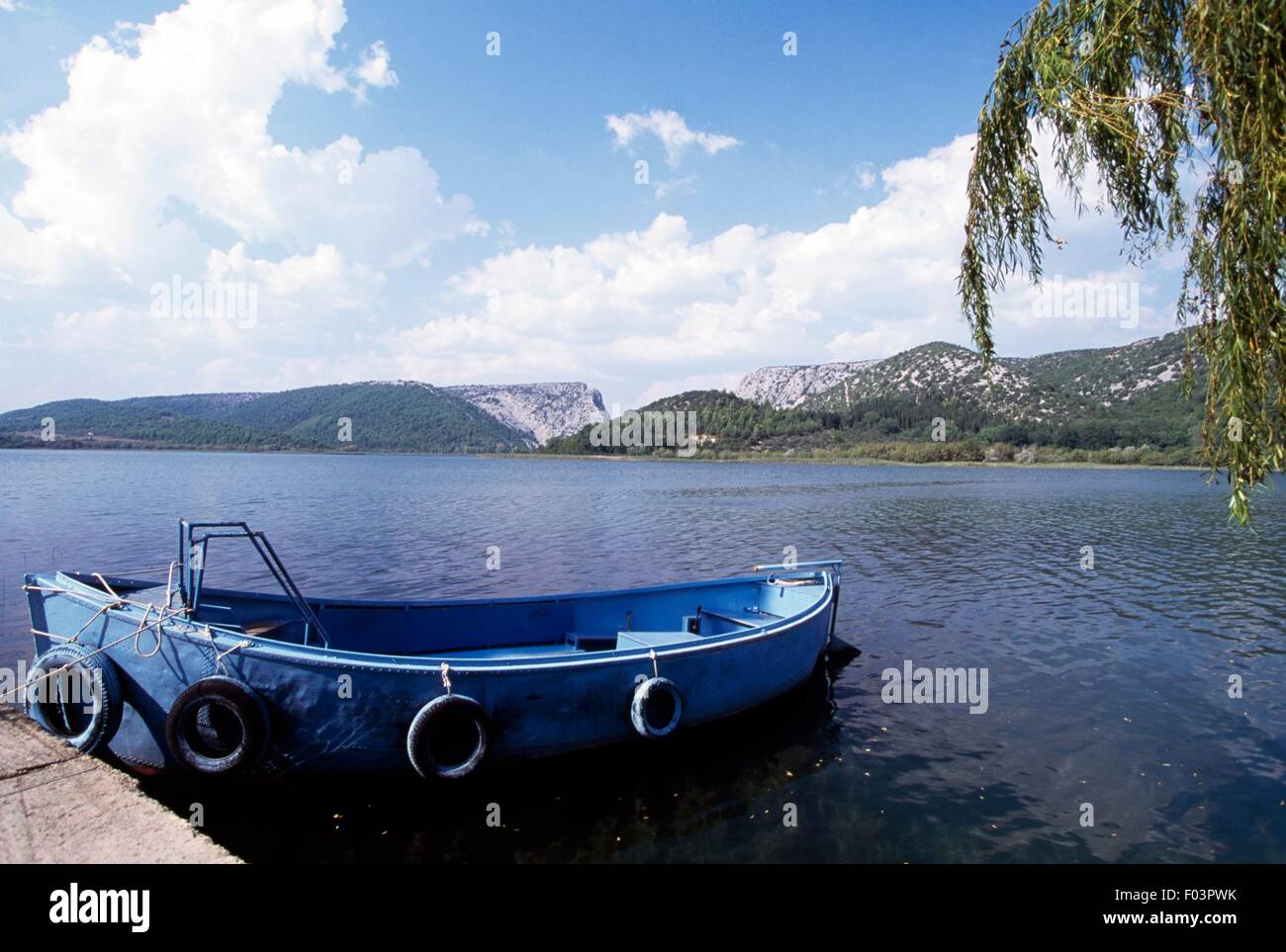 Boat moored on the shore of Lake Visovac, Visovac Island, Krka National ...
