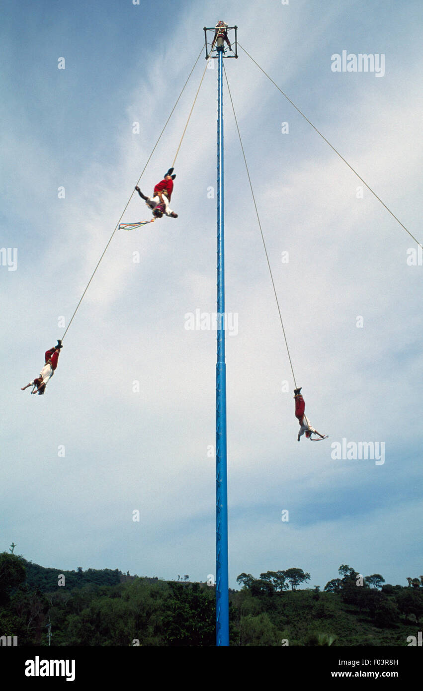 Voladores (flying men) launching themselves from the platform atop the ...