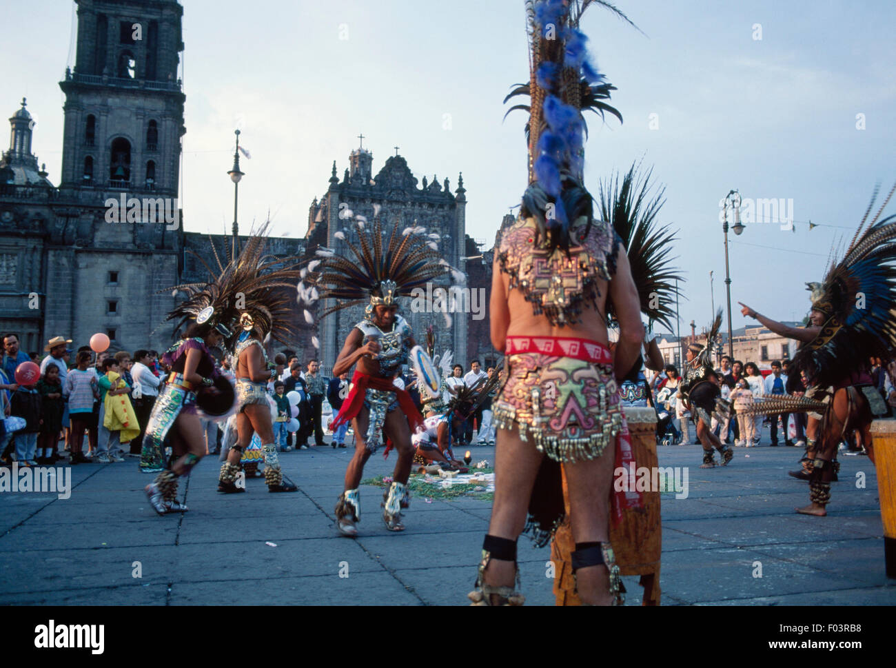 Dancers in Aztec costumes in the Zocalo (Constitution Square), Mexico ...