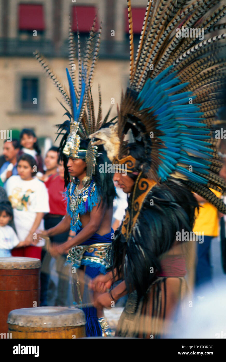 Dancers in Aztec costumes in the Zocalo (Constitution Square), Mexico ...