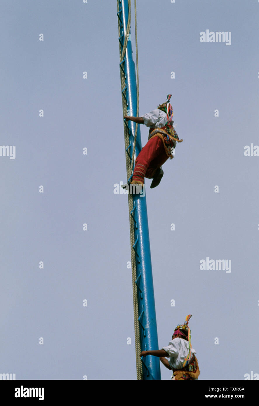 Voladores (flying men) climbing the pole, El Tajin, Veracruz, Mexico ...