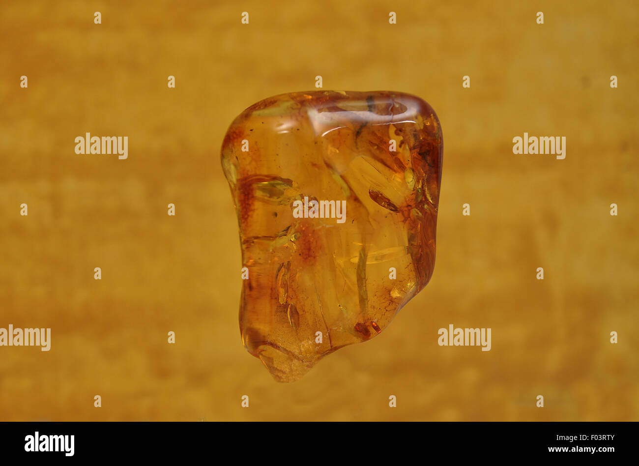 Amber on yellow Stock Photo - Alamy