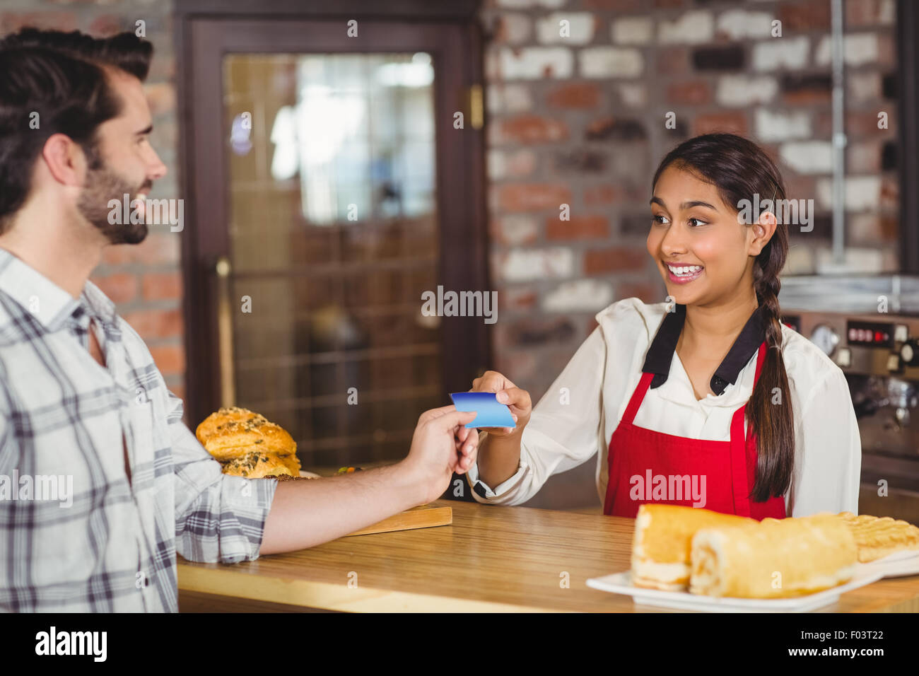 Handing hi-res stock photography and images - Alamy