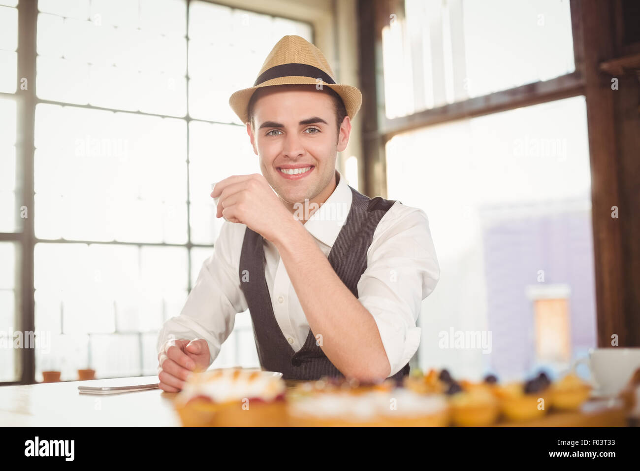 Man sitting next to table hi-res stock photography and images - Alamy