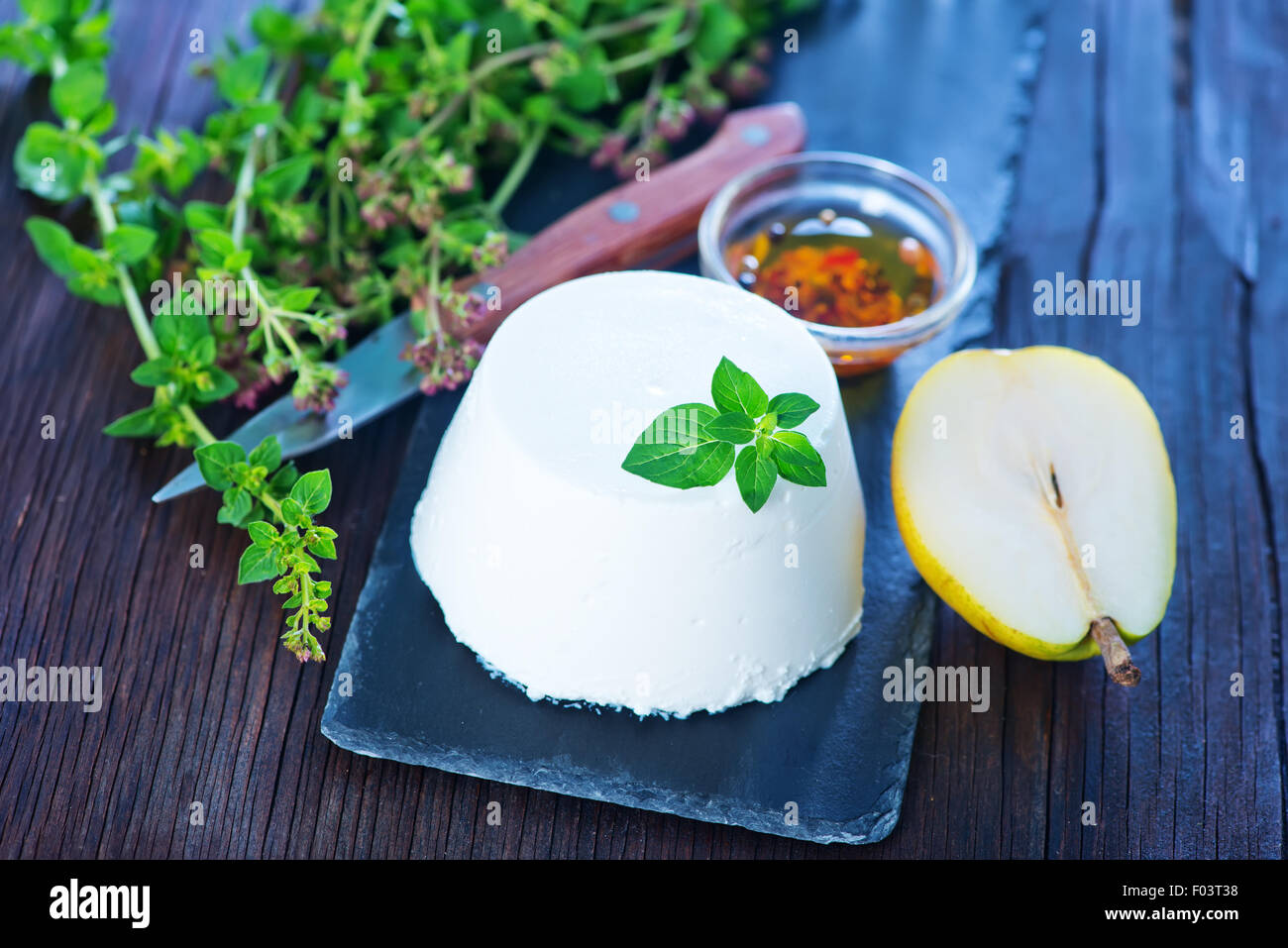 ricotta cheese with fresh pear on a table Stock Photo - Alamy