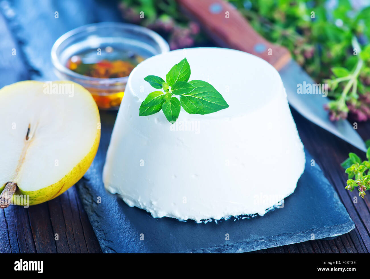 ricotta cheese with fresh pear on a table Stock Photo - Alamy