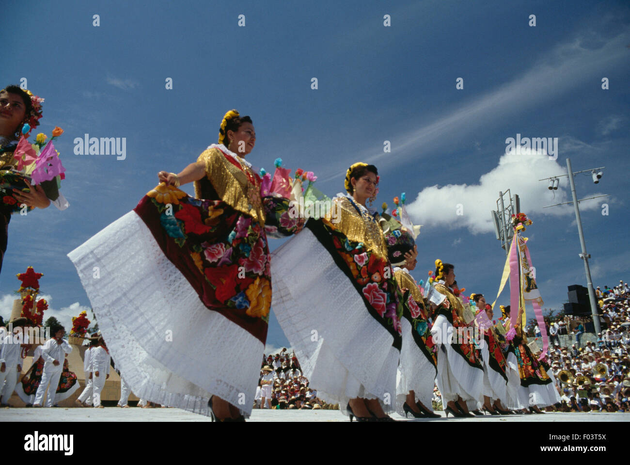 Women in traditional costumes, Jarabe Mixteco dance during the ...